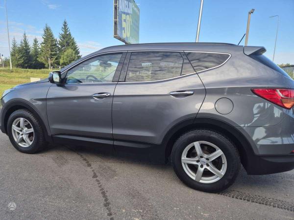 Pelēks Hyundai Santa Fe 2013 Utena, ar dzinēja tilpumu 2.20 L un nobraukumu 241 tūkst. km par 8950 €, foto 6 vietnē AUTOMOTO.COM.LV