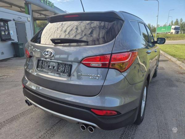 Pelēks Hyundai Santa Fe 2013 Utena, ar dzinēja tilpumu 2.20 L un nobraukumu 241 tūkst. km par 8950 €, foto 7 vietnē AUTOMOTO.COM.LV
