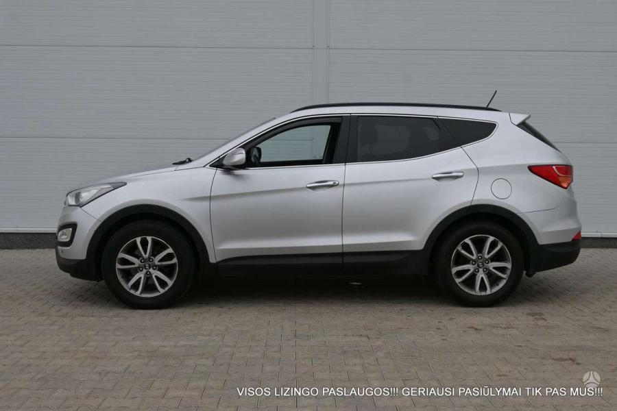 Grey Hyundai Santa Fe 2013 in Kretinga, with an engine capacity of 2.00 L and mileage of 269 thousand km for 8999 €, photo 12 on AUTOMOTO.COM.LV