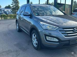 Pelēks Hyundai Santa Fe 2013 Utena, ar dzinēja tilpumu 2.20 L un nobraukumu 241 tūkst. km par 8850 €, foto 12 vietnē AUTOMOTO.COM.LV