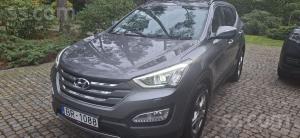 Grey Hyundai Santa Fe 2013 in Jurmala, with an engine capacity of 2.20 L and mileage of 169 thousand km for 10000 €, photo 1 on AUTOMOTO.COM.LV