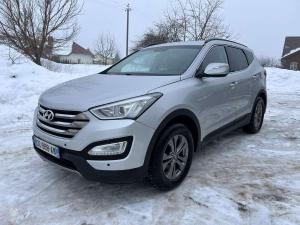 Pelēks Hyundai Santa Fe 2014 Viļņa, ar dzinēja tilpumu 2.20 L un nobraukumu 198 tūkst. km par 9100 €, foto  vietnē AUTOMOTO.COM.LV