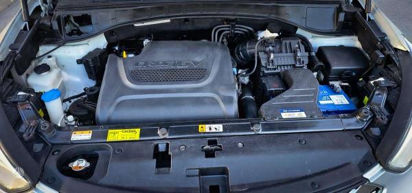 Grey Hyundai Santa Fe 2014 in Marijampole, with an engine capacity of 2.20 L and mileage of 160 thousand km for 10330 €, photo 54 on AUTOMOTO.COM.LV