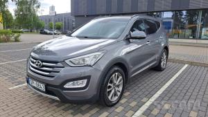 Pelēks Hyundai Santa Fe 2014 Rīga, ar dzinēja tilpumu 2.20 L un nobraukumu 174 tūkst. km par 13400 €, foto  vietnē AUTOMOTO.COM.LV