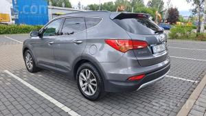 Pelēks Hyundai Santa Fe 2014 Rīga, ar dzinēja tilpumu 2.20 L un nobraukumu 174 tūkst. km par 13400 €, foto 4 vietnē AUTOMOTO.COM.LV