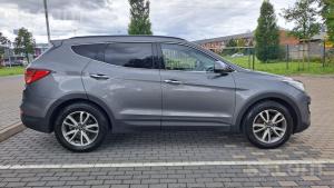 Pelēks Hyundai Santa Fe 2014 Rīga, ar dzinēja tilpumu 2.20 L un nobraukumu 174 tūkst. km par 13400 €, foto 7 vietnē AUTOMOTO.COM.LV