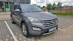 Pelēks Hyundai Santa Fe 2014 Rīga, ar dzinēja tilpumu 2.20 L un nobraukumu 174 tūkst. km par 13400 €, foto 8 vietnē AUTOMOTO.COM.LV