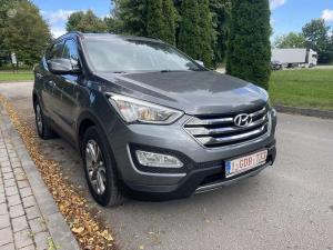 Grey Hyundai Santa Fe 2014 in Taurage, with an engine capacity of 2.00 L and mileage of 260 thousand km for 7800 €, photo 3 on AUTOMOTO.COM.LV