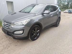 Grey Hyundai Santa Fe 2014 in Ukmerge, with an engine capacity of 2.20 L and mileage of 253 thousand km for 9000 €, photo 4 on AUTOMOTO.COM.LV
