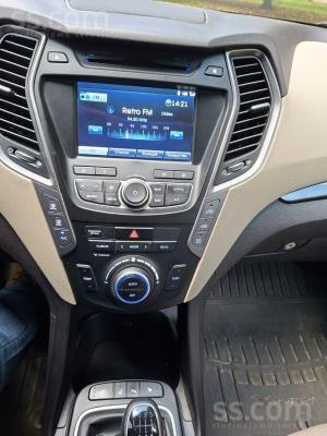 Pelēks Hyundai Santa Fe 2014 Rīga, ar dzinēja tilpumu 2.20 L un nobraukumu 257 tūkst. km par 9400 €, foto 19 vietnē AUTOMOTO.COM.LV