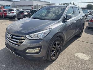 Pelēks Hyundai Santa Fe 2015 Marijampole, ar dzinēja tilpumu 2.20 L un nobraukumu 205 tūkst. km par 7700 €, foto  vietnē AUTOMOTO.COM.LV