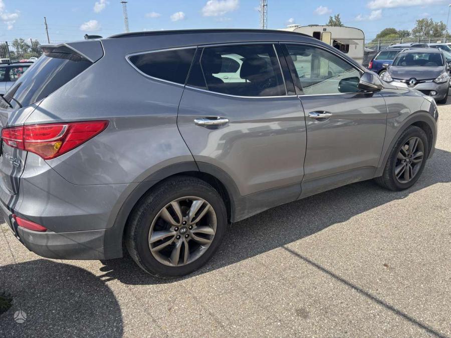Pelēks Hyundai Santa Fe 2015 Marijampole, ar dzinēja tilpumu 2.20 L un nobraukumu 205 tūkst. km par 7700 €, foto 5 vietnē AUTOMOTO.COM.LV
