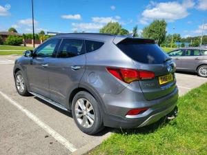 Pelēks Hyundai Santa Fe 2016 Alīta, ar dzinēja tilpumu 2.20 L un nobraukumu 108 tūkst. km par 6200 €, foto 5 vietnē AUTOMOTO.COM.LV