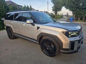 Grey Hyundai Santa Fe 2024 in Siauliai, with an engine capacity of 1.60 L and mileage of 15 thousand km for 43900 €, photo 1 on AUTOMOTO.COM.LV