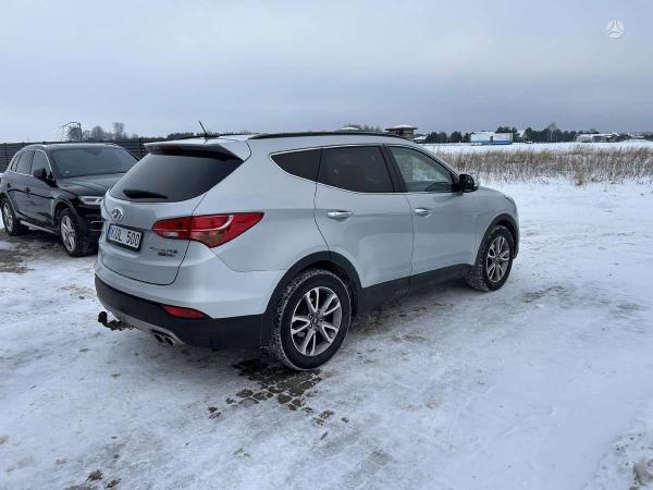 Pelēks Hyundai Santa Fe 2015 Kretinga, ar dzinēja tilpumu 2.00 L un nobraukumu 204 tūkst. km par 12650 €, foto 6 vietnē AUTOMOTO.COM.LV
