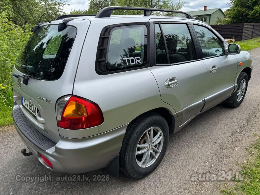 Grey Hyundai Santa Fe 2001 in Rakvere, with an engine capacity of 2.40 L and mileage of 223 thousand km for 1199 €, photo 5 on AUTOMOTO.COM.LV