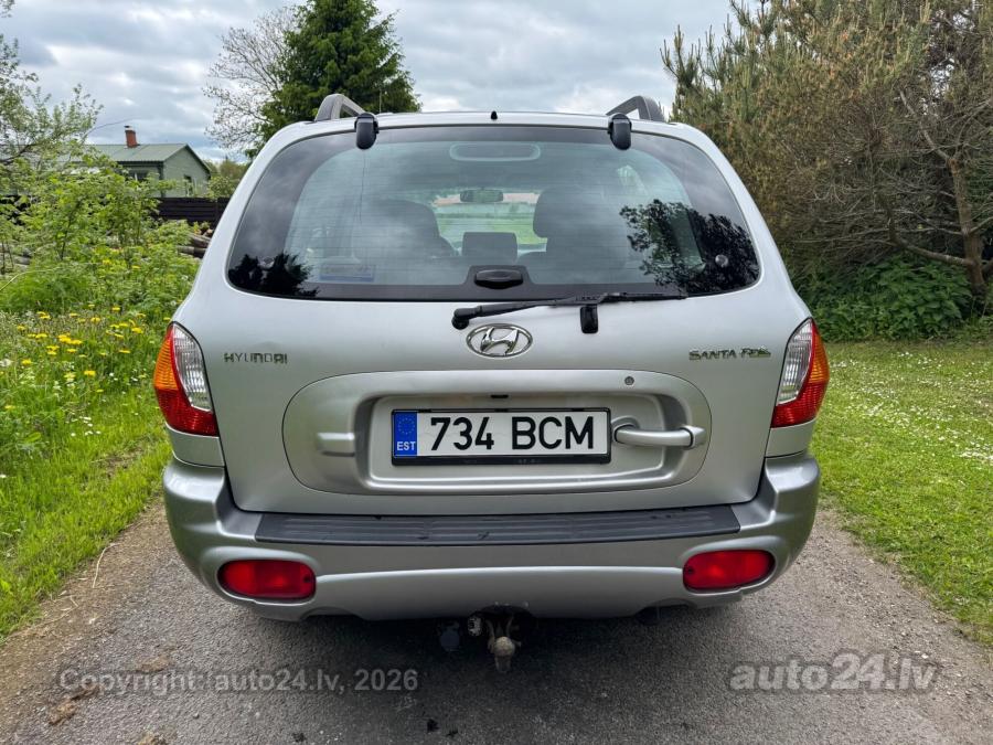 Grey Hyundai Santa Fe 2001 in Rakvere, with an engine capacity of 2.40 L and mileage of 223 thousand km for 1199 €, photo 6 on AUTOMOTO.COM.LV