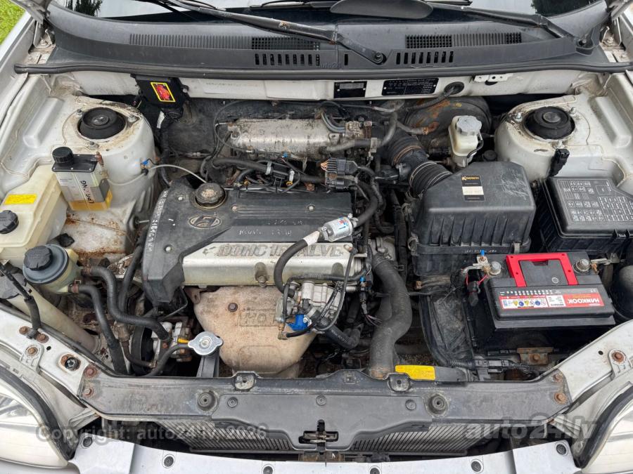 Grey Hyundai Santa Fe 2001 in Rakvere, with an engine capacity of 2.40 L and mileage of 223 thousand km for 1199 €, photo 9 on AUTOMOTO.COM.LV