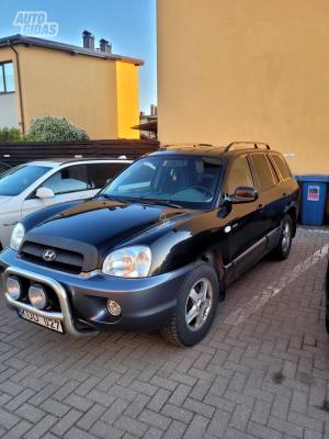 Hyundai Santa Fe 2006 in Kaunas, with an engine capacity of 2.40 L and mileage of 299 thousand km for 1500 €, photo 4 on AUTOMOTO.COM.LV