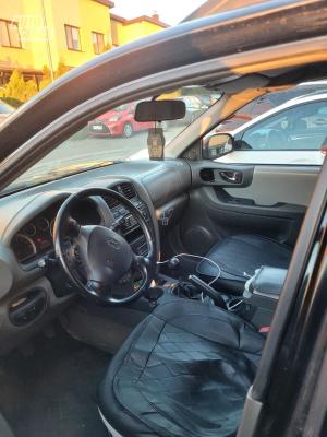 Hyundai Santa Fe 2006 in Kaunas, with an engine capacity of 2.40 L and mileage of 299 thousand km for 1500 €, photo 5 on AUTOMOTO.COM.LV