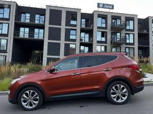 Orange Hyundai Santa Fe 2015 in Vilnius, with an engine capacity of 2.00 L and mileage of 100 thousand km for 12999 €, photo 8 on AUTOMOTO.COM.LV