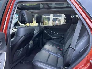 Orange Hyundai Santa Fe 2015 in Vilnius, with an engine capacity of 2.00 L and mileage of 100 thousand km for 12999 €, photo 12 on AUTOMOTO.COM.LV