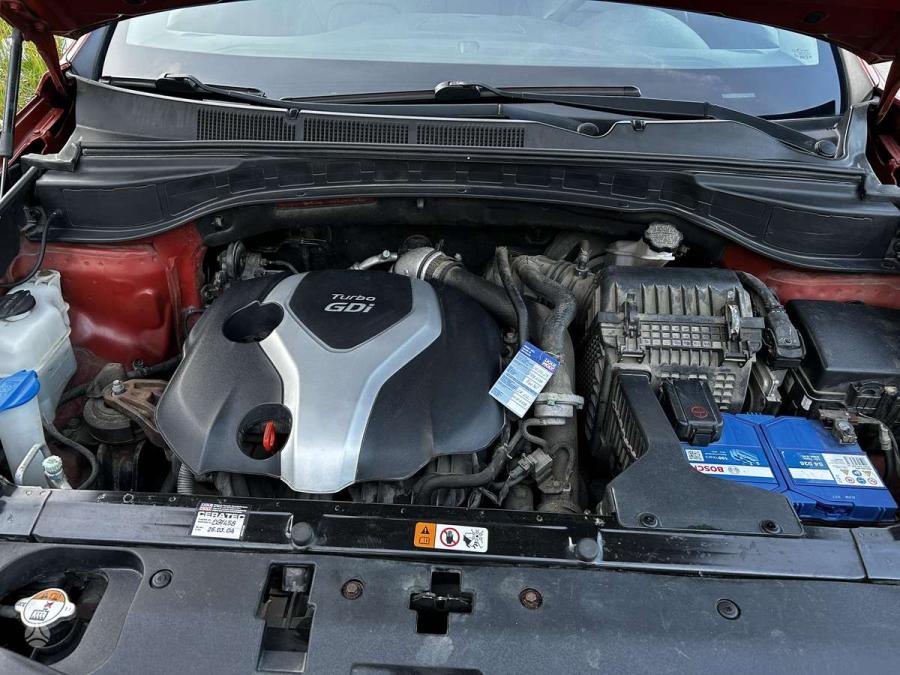 Orange Hyundai Santa Fe 2015 in Vilnius, with an engine capacity of 2.00 L and mileage of 100 thousand km for 12999 €, photo 18 on AUTOMOTO.COM.LV