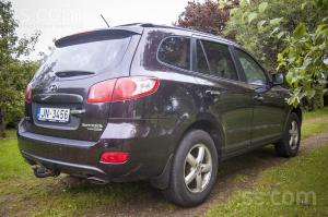 Sarkans Hyundai Santa Fe 2006 Ogre, ar dzinēja tilpumu 2.20 L un nobraukumu 181 tūkst. km par 4000 €, foto 3 vietnē AUTOMOTO.COM.LV