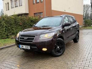 Red Hyundai Santa Fe 2007 in Riga, with an engine capacity of 2.20 L and mileage of 270 thousand km for 3300 €, photo 2 on AUTOMOTO.COM.LV