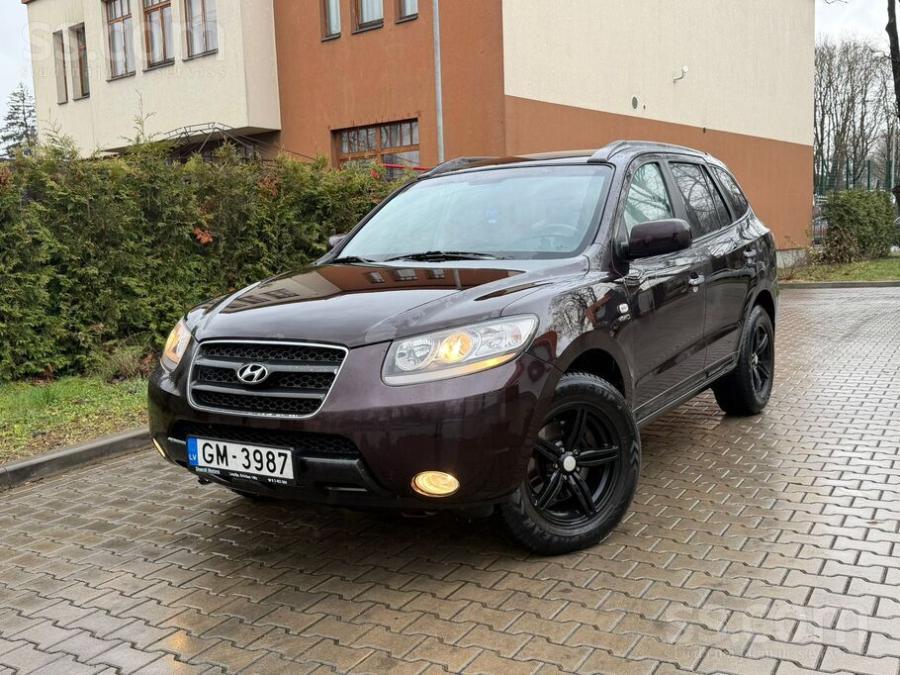 Red Hyundai Santa Fe 2007 in Riga, with an engine capacity of 2.20 L and mileage of 270 thousand km for 3300 €, photo 2 on AUTOMOTO.COM.LV