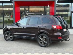 Sarkans Hyundai Santa Fe 2007 Rīga, ar dzinēja tilpumu 2.20 L un nobraukumu 313 tūkst. km par 2990 €, foto 4 vietnē AUTOMOTO.COM.LV