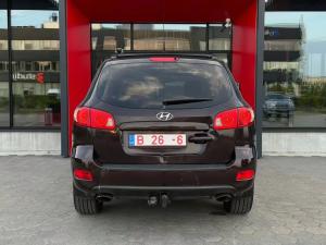 Sarkans Hyundai Santa Fe 2007 Rīga, ar dzinēja tilpumu 2.20 L un nobraukumu 313 tūkst. km par 2990 €, foto 5 vietnē AUTOMOTO.COM.LV