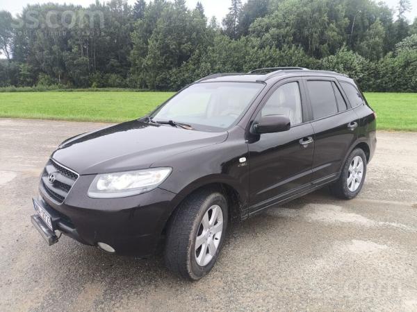 Red Hyundai Santa Fe 2007 in Dobele, with an engine capacity of 2.20 L and mileage of 339 thousand km for 4300 €, photo 2 on AUTOMOTO.COM.LV