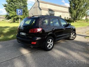 Red Hyundai Santa Fe 2008 in Riga, with an engine capacity of 2.20 L and mileage of 320 thousand km for 2000 €, photo 3 on AUTOMOTO.COM.LV
