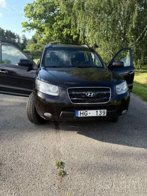 Red Hyundai Santa Fe 2008 in Riga, with an engine capacity of 2.20 L and mileage of 320 thousand km for 2000 €, photo 7 on AUTOMOTO.COM.LV