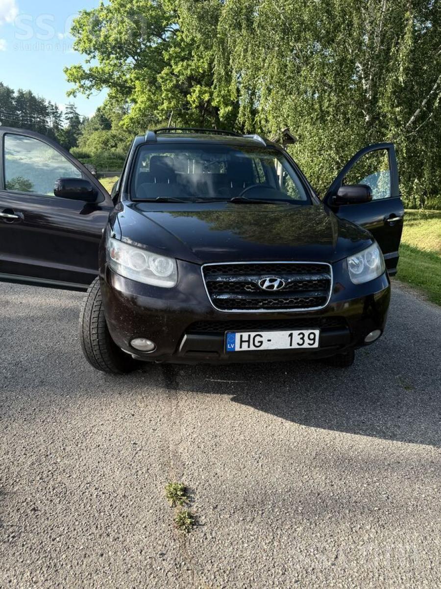 Red Hyundai Santa Fe 2008 in Riga, with an engine capacity of 2.20 L and mileage of 320 thousand km for 2000 €, photo 7 on AUTOMOTO.COM.LV