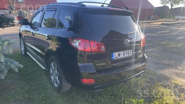 Sarkans Hyundai Santa Fe 2009 Dobele, ar dzinēja tilpumu 2.20 L un nobraukumu 295 tūkst. km par 3800 €, foto 5 vietnē AUTOMOTO.COM.LV