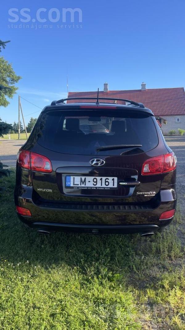 Sarkans Hyundai Santa Fe 2009 Dobele, ar dzinēja tilpumu 2.20 L un nobraukumu 295 tūkst. km par 3800 €, foto 6 vietnē AUTOMOTO.COM.LV