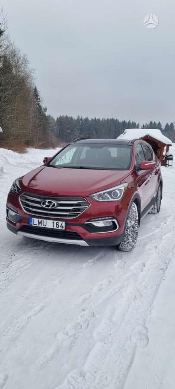 Red Hyundai Santa Fe 2017 in Vilnius, with an engine capacity of 2.00 L and mileage of 58 thousand km for 14800 €, photo 1 on AUTOMOTO.COM.LV