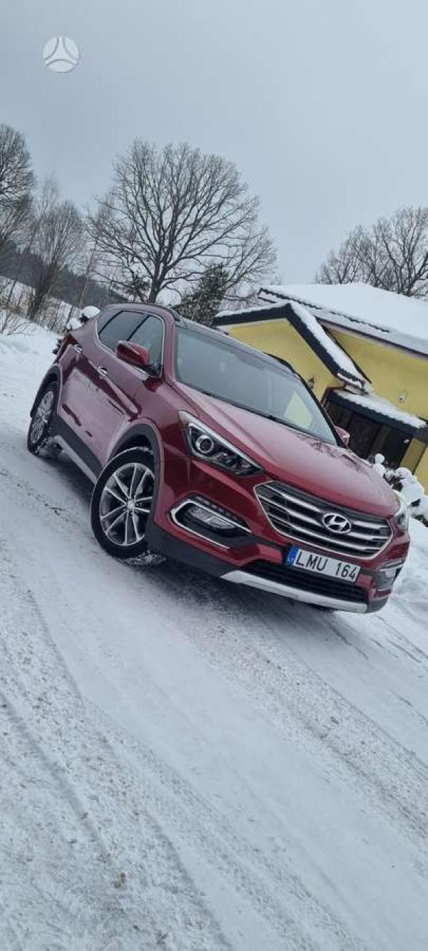 Red Hyundai Santa Fe 2017 in Vilnius, with an engine capacity of 2.00 L and mileage of 58 thousand km for 14800 €, photo 7 on AUTOMOTO.COM.LV