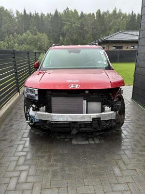 Red Hyundai Santa Fe 2025 in Plunge, with an engine capacity of 1.60 L and mileage of 7 thousand km for 19250 €, photo 5 on AUTOMOTO.COM.LV