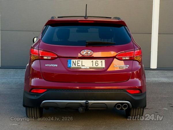 Red Hyundai Santa Fe 2012 in Tallinn, with an engine capacity of 2.20 L and mileage of 243 thousand km for 8990 €, photo 6 on AUTOMOTO.COM.LV