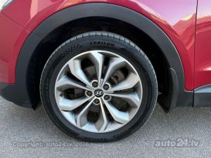 Sarkans Hyundai Santa Fe 2012 Tallina, ar dzinēja tilpumu 2.20 L un nobraukumu 243 tūkst. km par 8990 €, foto 24 vietnē AUTOMOTO.COM.LV