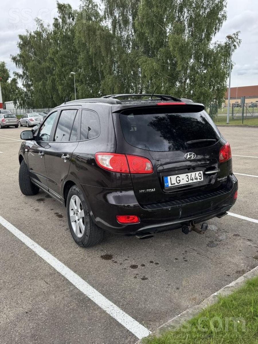 Violets Hyundai Santa Fe 2006 Rīga, ar dzinēja tilpumu 2.20 L un nobraukumu 367 tūkst. km par 2300 €, foto 4 vietnē AUTOMOTO.COM.LV