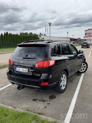 Violets Hyundai Santa Fe 2006 Rīga, ar dzinēja tilpumu 2.20 L un nobraukumu 367 tūkst. km par 2300 €, foto 5 vietnē AUTOMOTO.COM.LV
