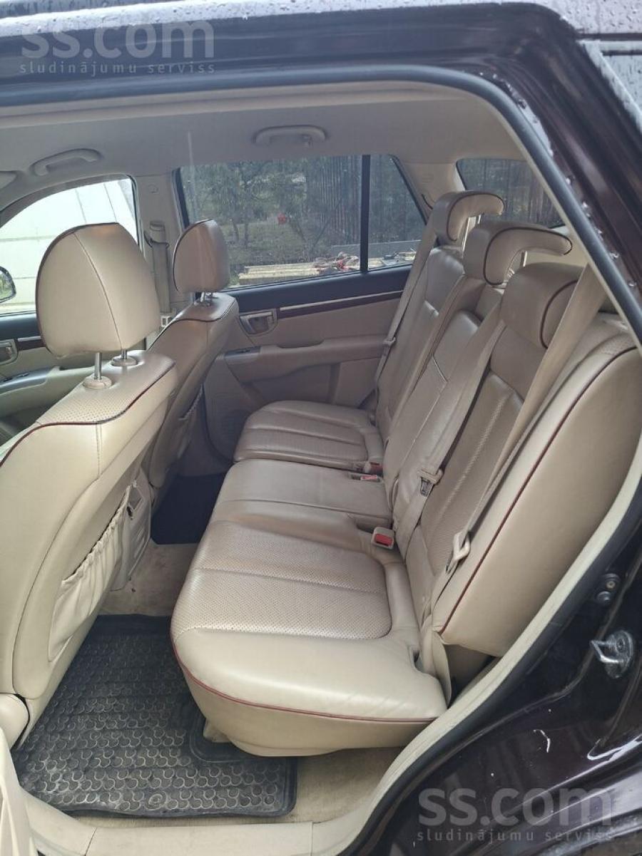 Violet Hyundai Santa Fe 2007 in Riga, with an engine capacity of 2.20 L and mileage of 352 thousand km for 2700 €, photo 12 on AUTOMOTO.COM.LV