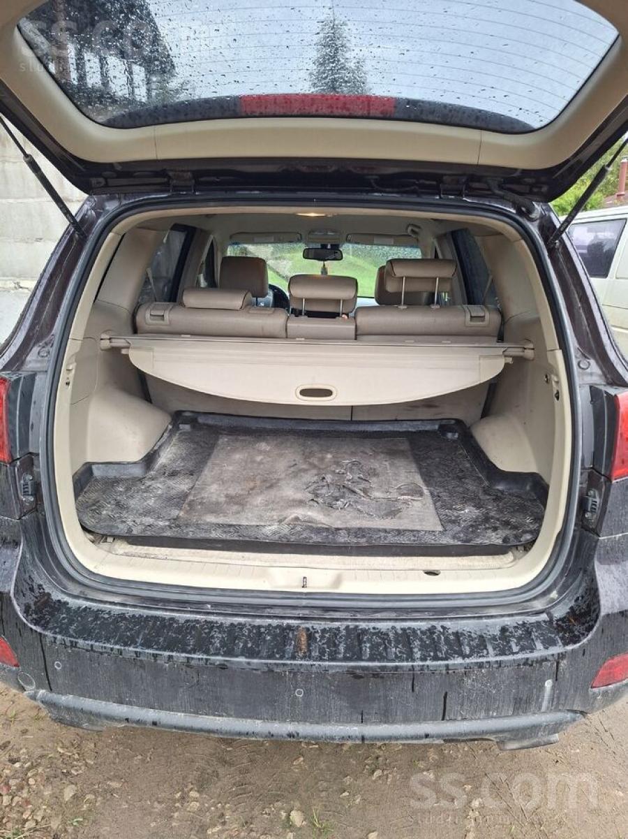 Violet Hyundai Santa Fe 2007 in Riga, with an engine capacity of 2.20 L and mileage of 352 thousand km for 2700 €, photo 13 on AUTOMOTO.COM.LV