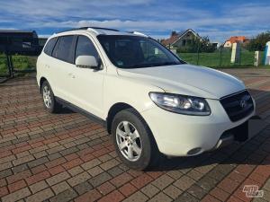 White Hyundai Santa Fe 2009 in Silute, with an engine capacity of 2.20 L and mileage of 238 thousand km for 3850 €, photo 12 on AUTOMOTO.COM.LV