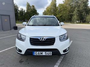 White Hyundai Santa Fe 2010 in Vilnius, with an engine capacity of 2.20 L and mileage of 162 thousand km for 4950 €, photo 4 on AUTOMOTO.COM.LV