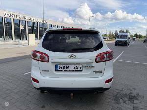 White Hyundai Santa Fe 2010 in Vilnius, with an engine capacity of 2.20 L and mileage of 162 thousand km for 4950 €, photo 8 on AUTOMOTO.COM.LV